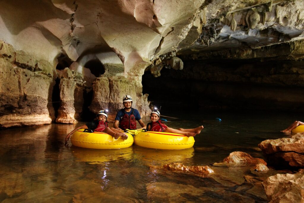 Rainforest Bridges in the Sky w/ Cave Tubing - Dark Night Cave Tubing ...
